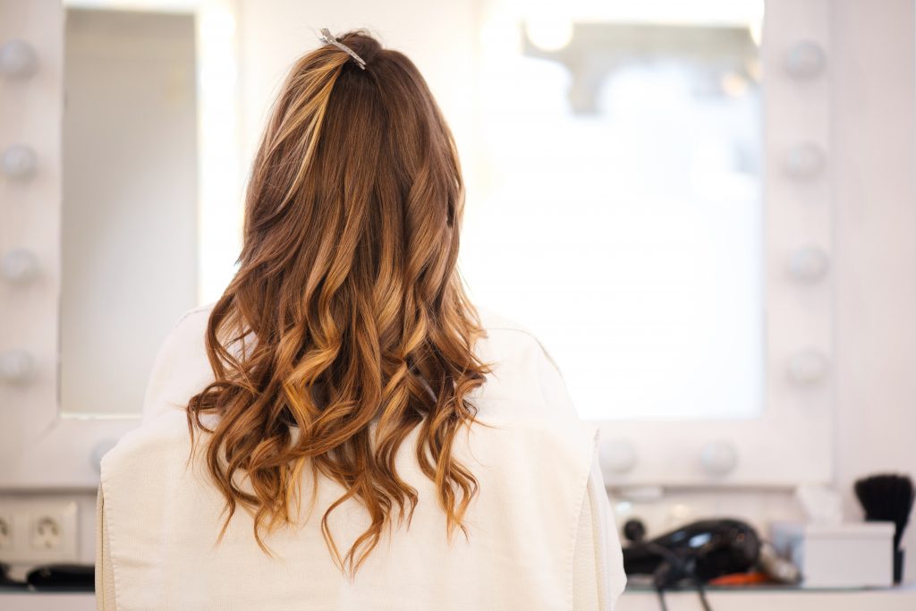How to Train your Hair to Part on the Other Side - Hair World Magazine